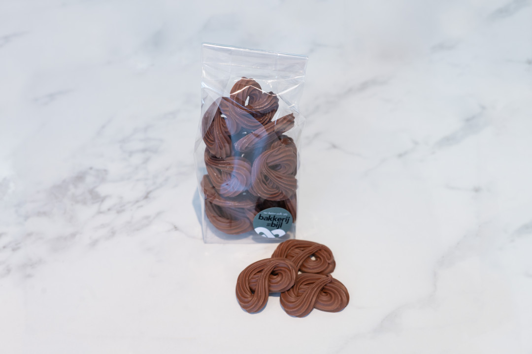 Zakje chocolade krakelingen melk - Bakkerij van der Bijl