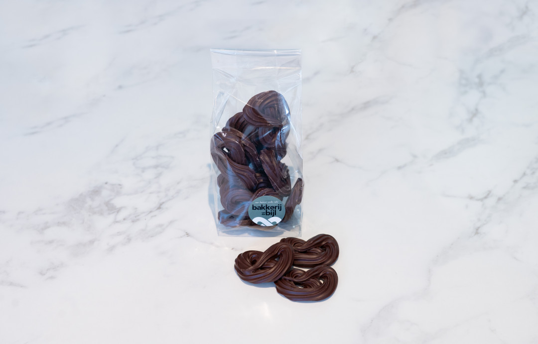 Zakje chocolade krakelingen puur - Bakkerij van der Bijl